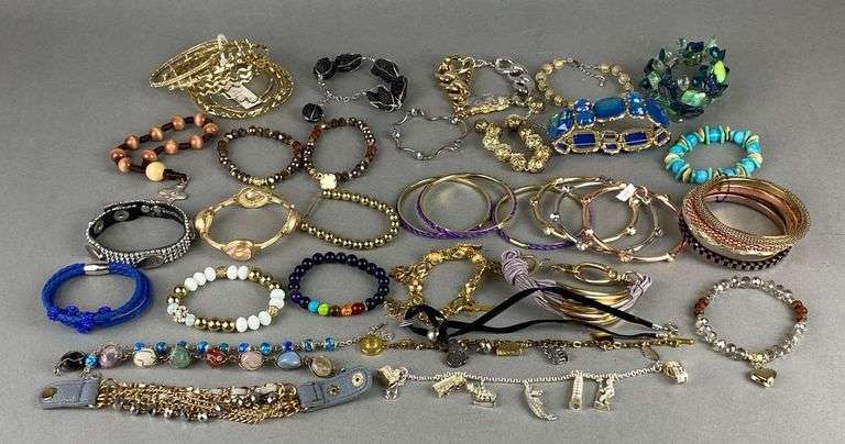 Group of Costume Jewelry Bracelets - Matthew Bullock Auctioneers