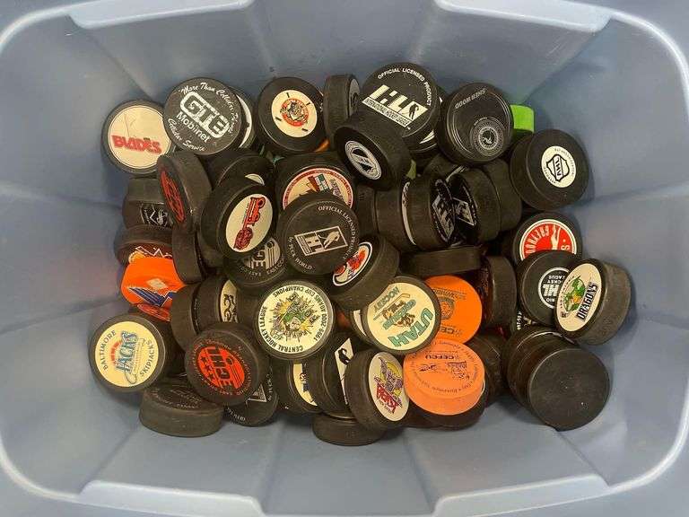 Group of NHL and AHL Hockey Pucks - Matthew Bullock Auctioneers
