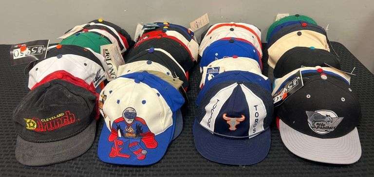 Large Group of Minor League Sports Team Hats - Matthew Bullock Auctioneers