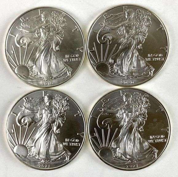 Group of 4 US $1 American Silver Eagle 1 oz .999 Silver Coins - Matthew Bullock Auctioneers
