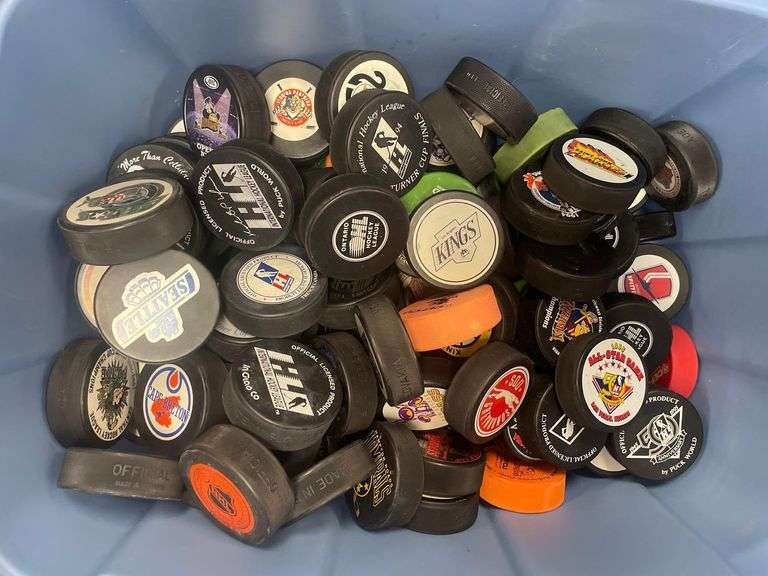 Group of NHL and AHL Hockey Pucks - Matthew Bullock Auctioneers