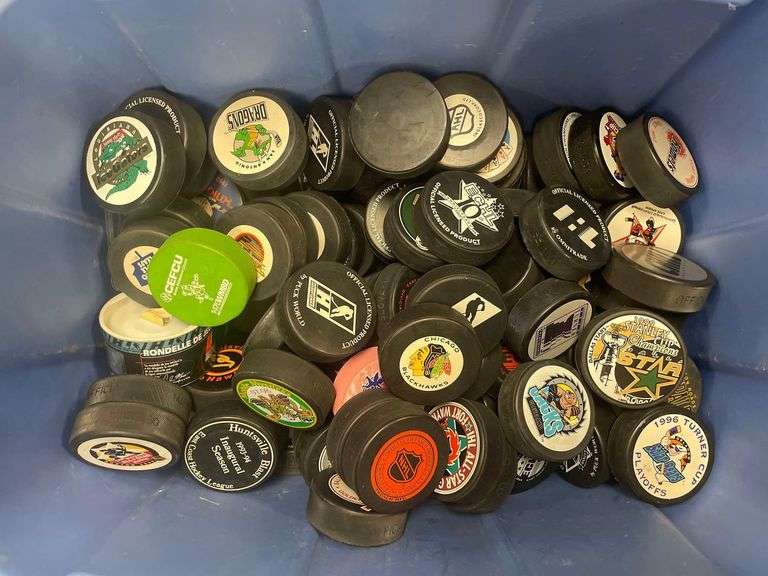 Group of NHL and AHL Hockey Pucks - Matthew Bullock Auctioneers