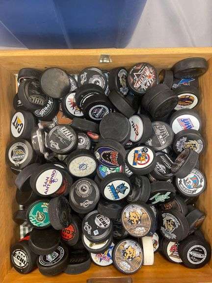 Group of NHL and AHL Hockey Pucks - Matthew Bullock Auctioneers