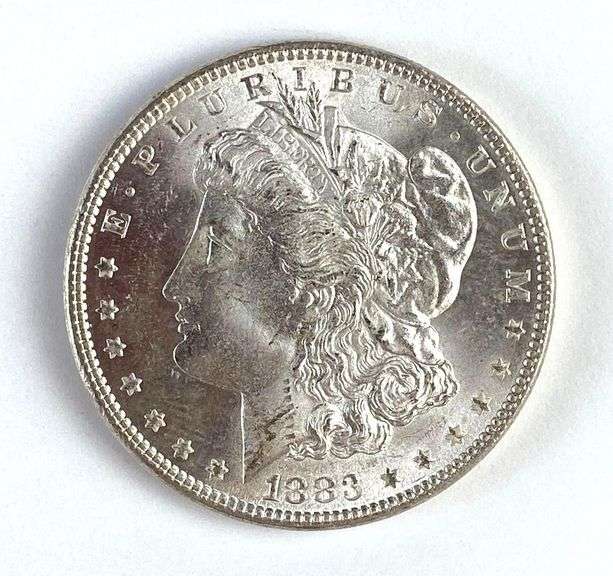 1883 US $1 Morgan Silver Dollar - Matthew Bullock Auctioneers