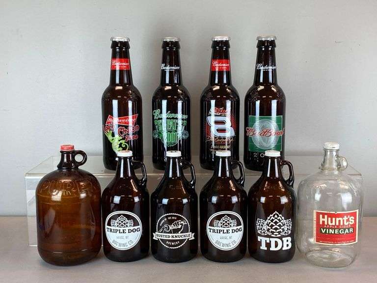 Group of Growlers and Oversized Beer Bottles - Matthew Bullock Auctioneers