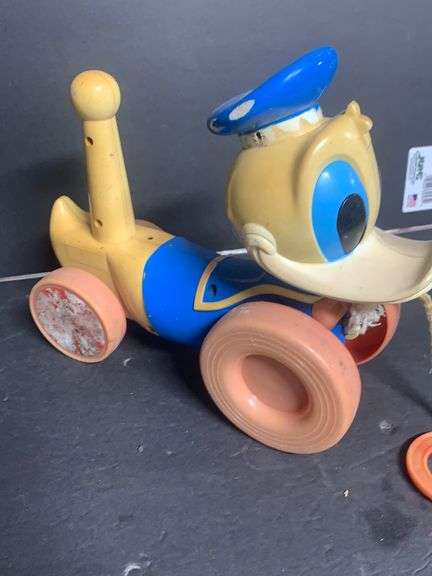 Illco Walt Disney pull toy - McNatt Real Estate