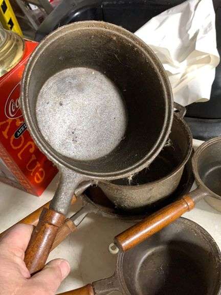 Complete set of cast iron cookware - McNatt Real Estate