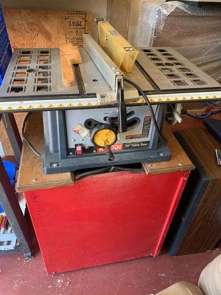Ryobi 10" table saw on work stand - McNatt Real Estate