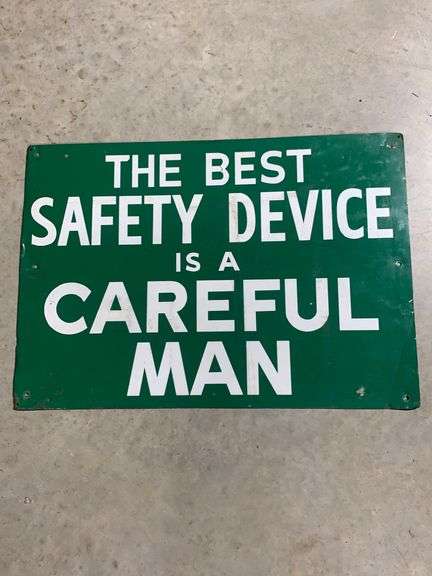 Old yellow back Careful man sign - McNatt Real Estate