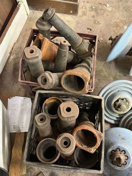 2 crates of Cast iron hubs - McNatt Real Estate
