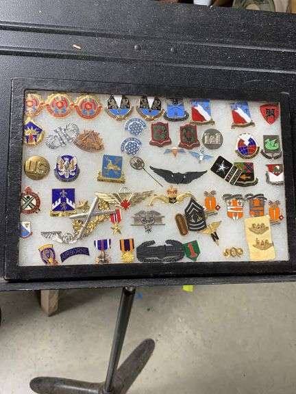 Awesome display case full of military pins and misc pins - McNatt Real Estate