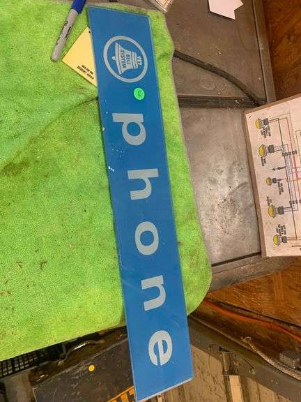 Glass telephone booth Bell sign - McNatt Real Estate