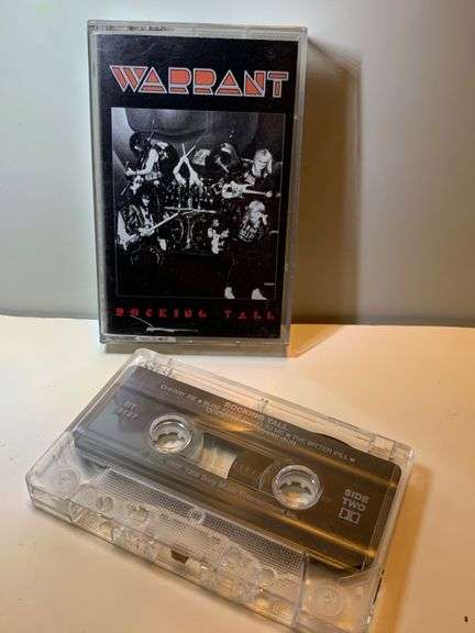 Warrant “Rocking Tall” cassette and case - McNatt Real Estate