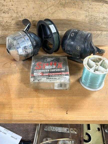 2 large Shakespeare reels and 3 spools of line - McNatt Real Estate