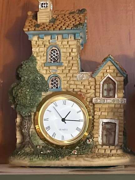 4 small clocks -see makers in photos - McNatt Real Estate