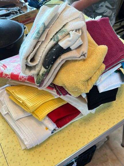 Lot dish towels and table cloths - McNatt Real Estate