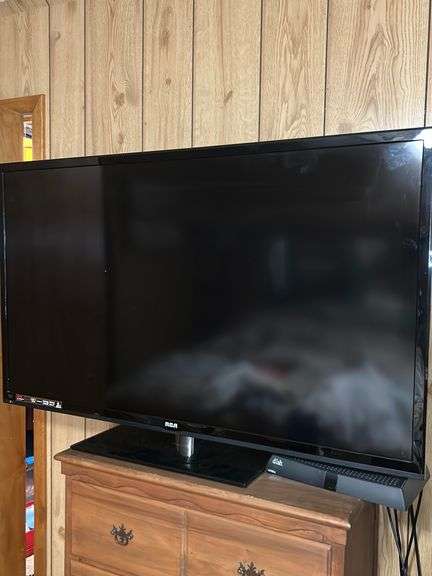 RCA Flatscreen TV -see all photo for info - McNatt Real Estate