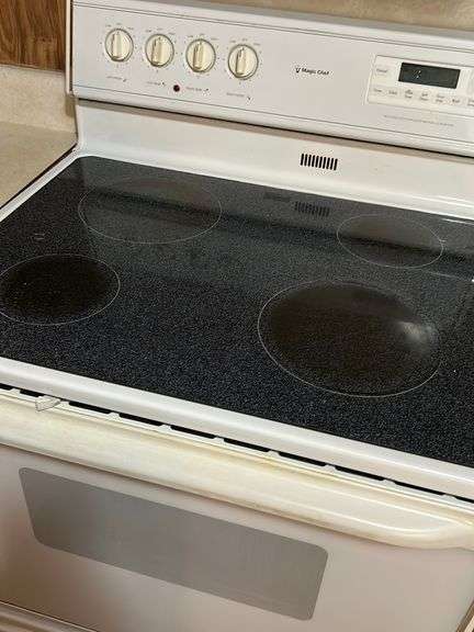 Working Magic chef glass top/flat top stove/range - McNatt Real Estate