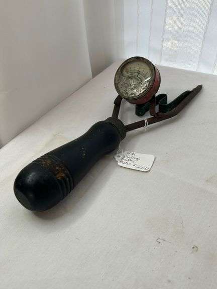 Neat old primitive battery tester - McNatt Real Estate