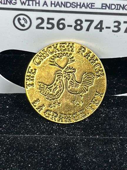 Novelty coin/token - McNatt Real Estate