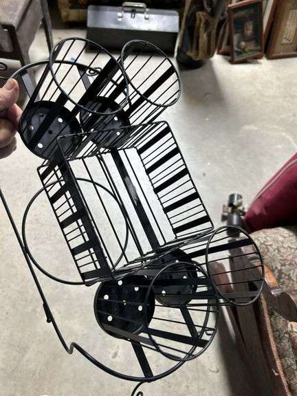 Old tennis racket-desk organizer-wore centerpiece - McNatt Real Estate