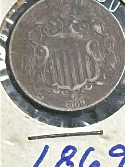 1869 Shield coin - McNatt Real Estate