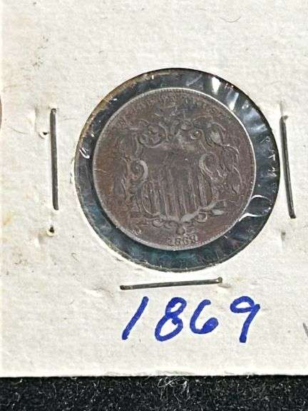 1869 Shield coin - McNatt Real Estate