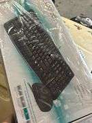 2 new Logitech desktop keyboards in boxes - McNatt Real Estate