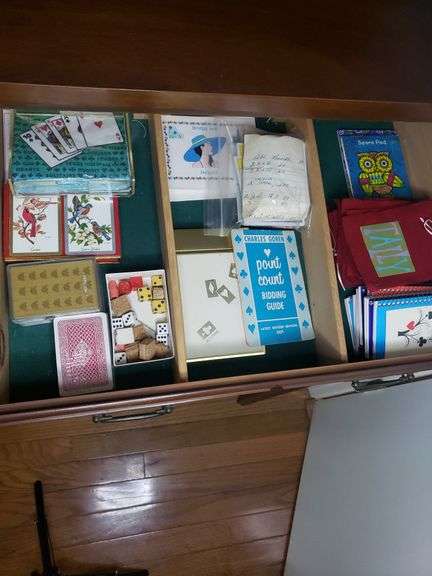 Drawer full of cards/games - McNatt Real Estate