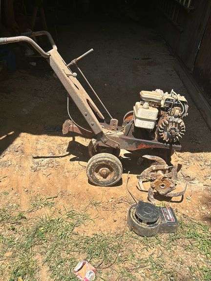 Old tiller -parts - McNatt Real Estate