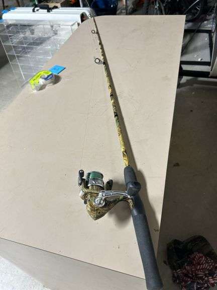 New! Camo Jimmy Houston Rod and reel combo set - McNatt Real Estate