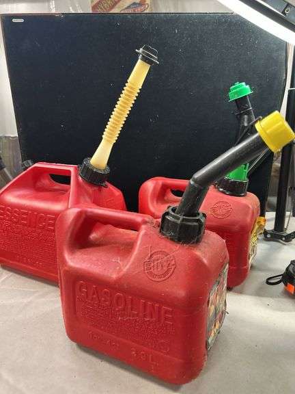 Gas jugs - (2) 1 gal and (1) 1.5 gal. - McNatt Real Estate