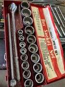 Large sockets and ratchets in metal box - McNatt Real Estate