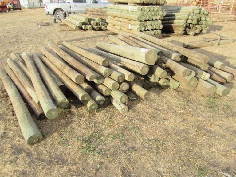 72 +/- TREATED LINE AND CORNER POSTS 6.5' TO 8' long SELLING AS ONE ...