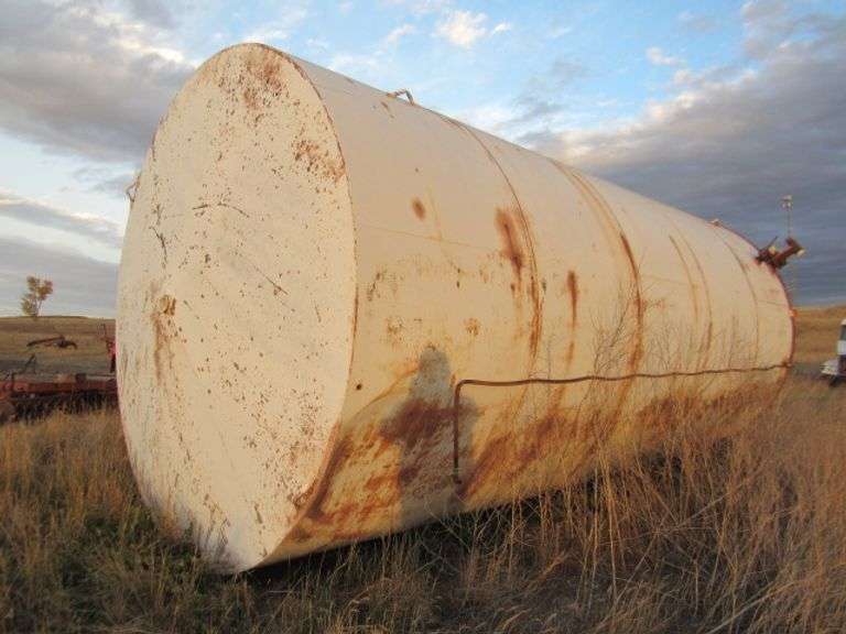 STEEL LIQUID STORAGE TANK 12' DIAM X 25' TALL - McPherson Auction & Realty