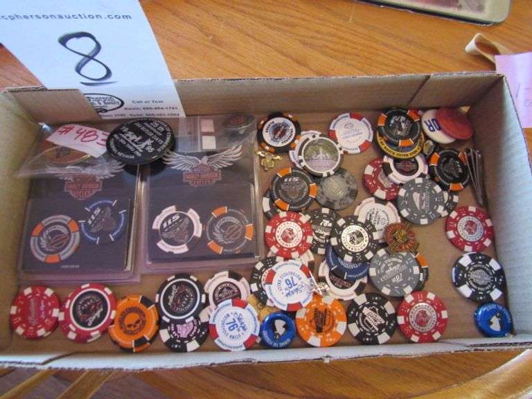 BOX WITH ASSTD TOKENS; SEVERAL ARE STURGIS, INDIAN MOTORCYCLE, HARLEY ...