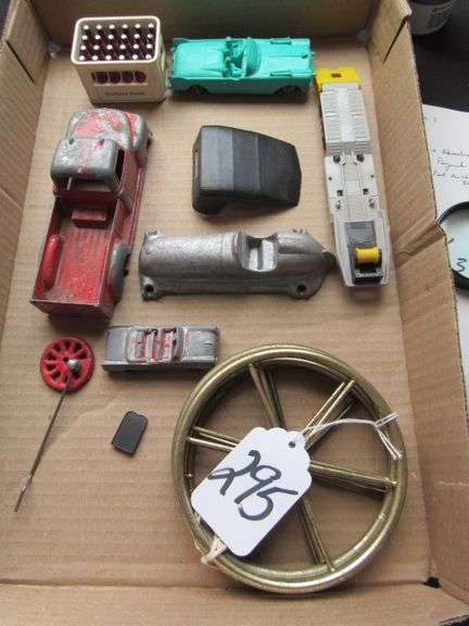 BOX OF ASSTD. TOY CAR PARTS - McPherson Auction & Realty