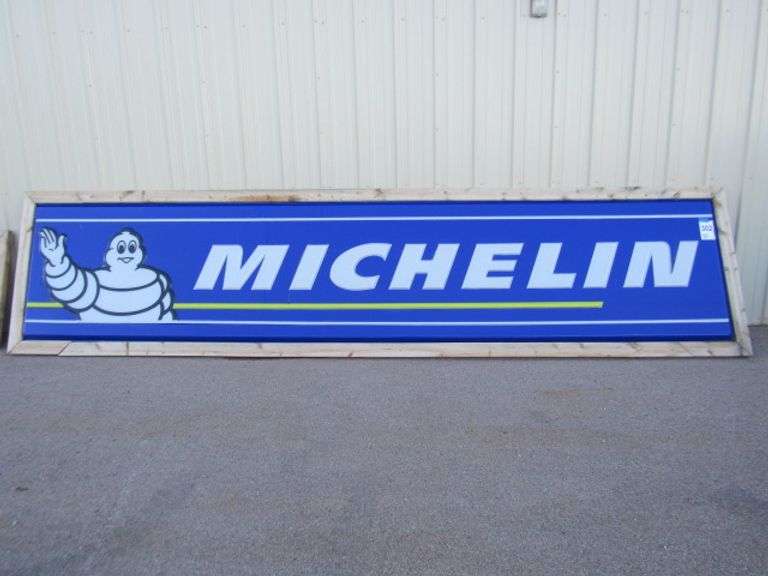 MICHELIN SIGN - 18' LONG X 45" TALL - PLASTIC - HAS A WOOD FRAME TO ...