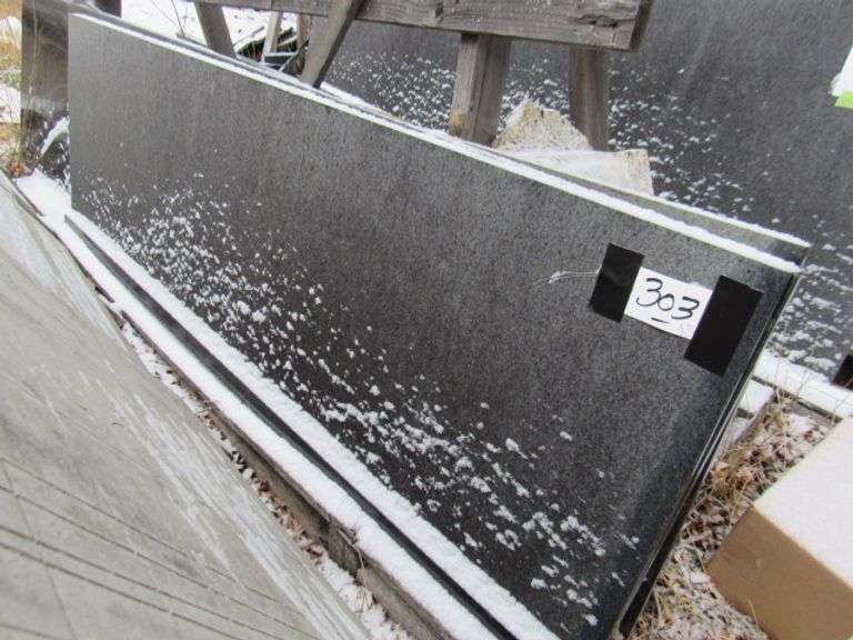 Group of three granite type countertops and assorted small pieces of ...