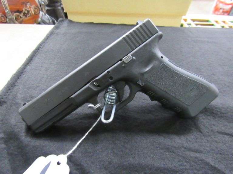 GLOCK 22C MODEL .40 S/N SRX716 WITH 2 CLIPS - McPherson Auction & Realty