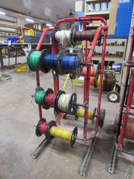 UPRIGHT WIRE CART WITH 12 SPOOLS OF WIRE - McPherson Auction & Realty