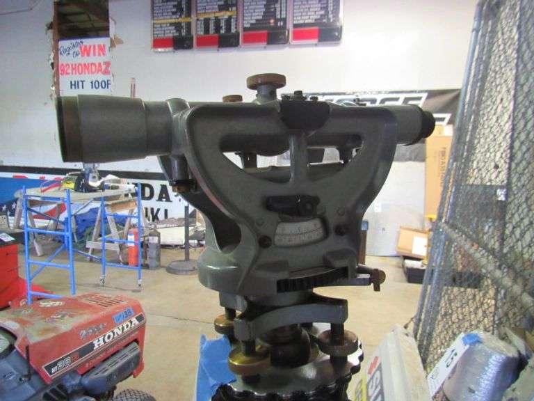 2 TRANSIT STANDS, MEASURING STICK AND A KEUFFEL AND ESSER CO. TRANSIT ...