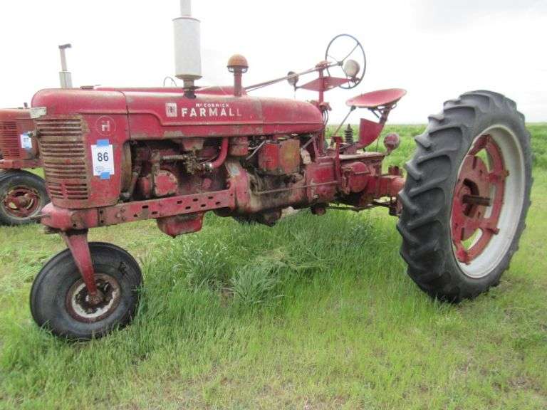 WEST "H" FARMALL SINGLE FRONT TIRE, RUBBER IS GOOD, KEPT INSIDE MOST OF ...