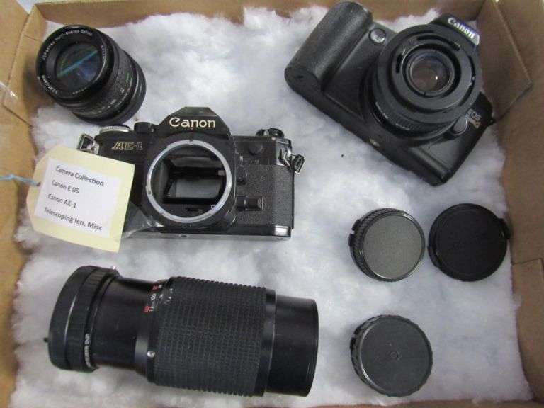 TWO CANNON CAMERAS, THREE LENSES AND THREE CAPS. - McPherson Auction ...