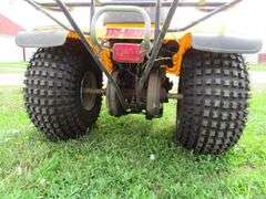 1982 YELLOW 125 YAMAHA THREE WHEELER. HAS BRAND NEW TIRES, USED TO RIDE ...