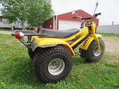 1982 YELLOW 125 YAMAHA THREE WHEELER. HAS BRAND NEW TIRES, USED TO RIDE ...