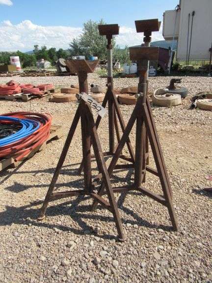FOUR STOCK STANDS ADJUSTABLE - McPherson Auction & Realty