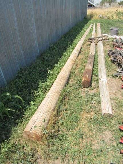 THREE 35' TELEPHONE POLES - McPherson Auction & Realty