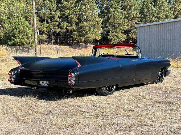 1960 CADILLAC CUSTOM CONVERTIBLE - McPherson Auction & Realty