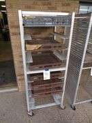 10 SHELF ALUMINUM BREAD RACK ON CASTERS - McPherson Auction & Realty